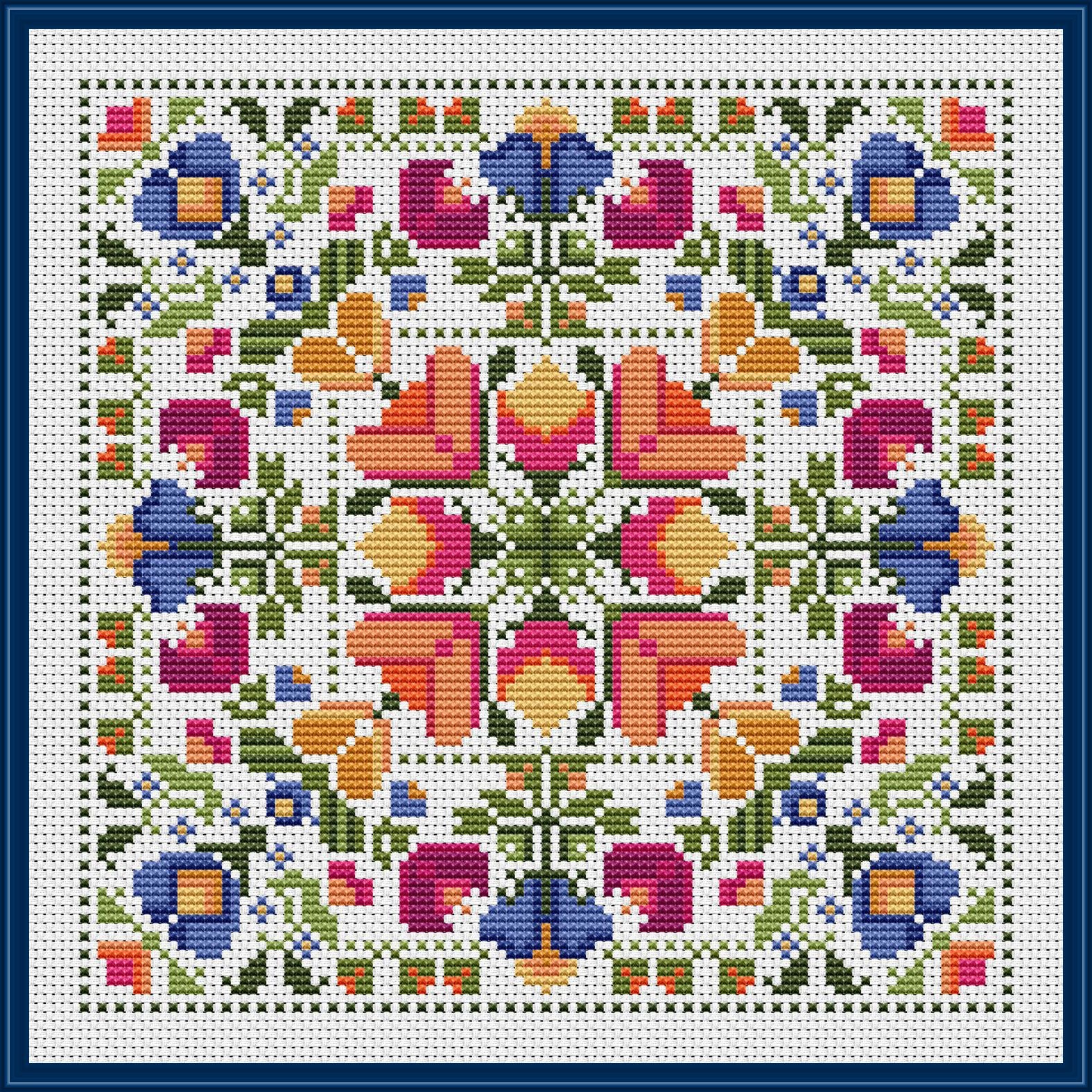 Spring Blooms Brightly | Carolyn Manning Designs – TopKnot Stitcher Shop